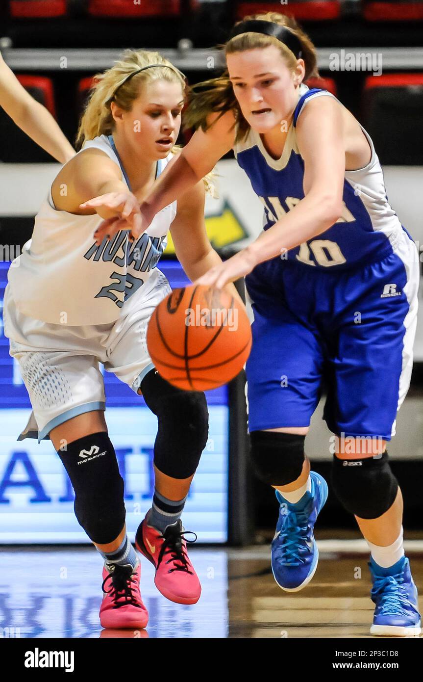 Muhlenberg County's Bailee Harney (23) and Mason County's Whitney O ...