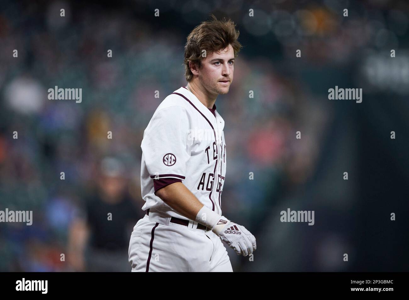 Hunter Haas (2) of the Texas A&M Aggies walks to first base after ...