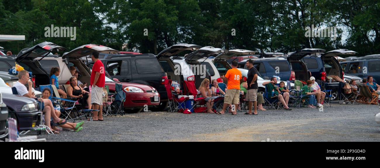 UNITED STATES - July 13: People wait for the movie to start at the ...