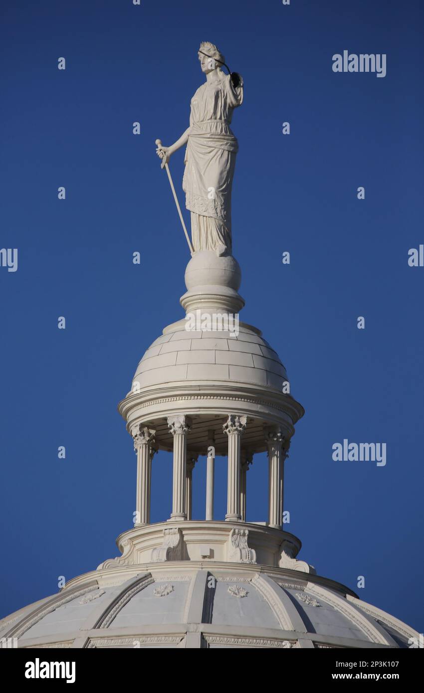 The Themis statute that crowns the historic courthouse in downtown Waco ...