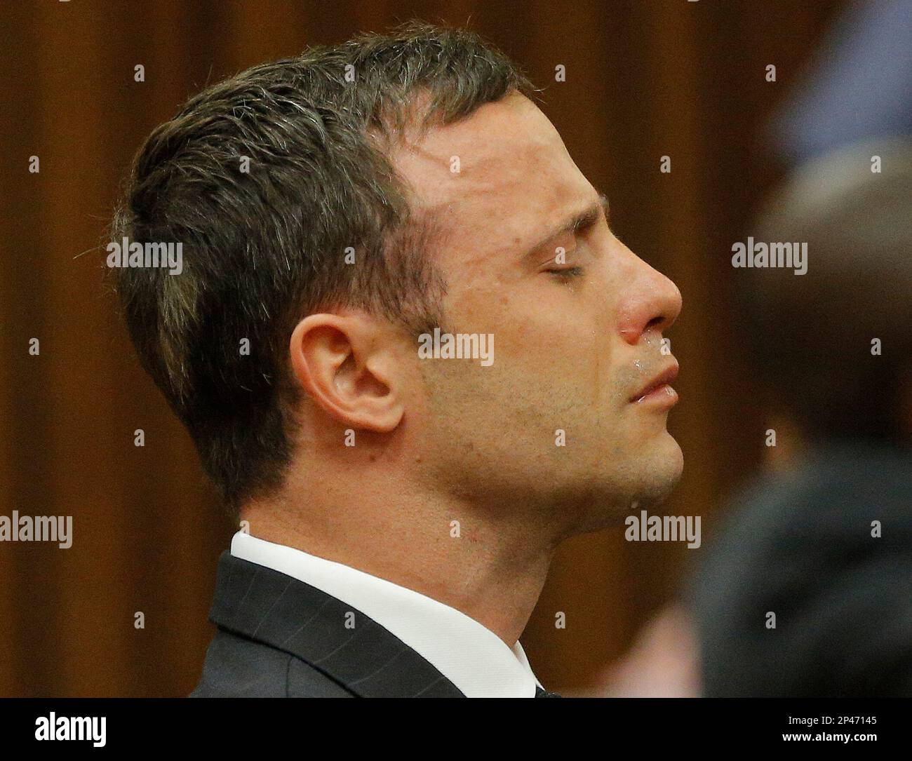 Oscar Pistorius reacts in the dock as Judge Thokozile Masipa delivers ...
