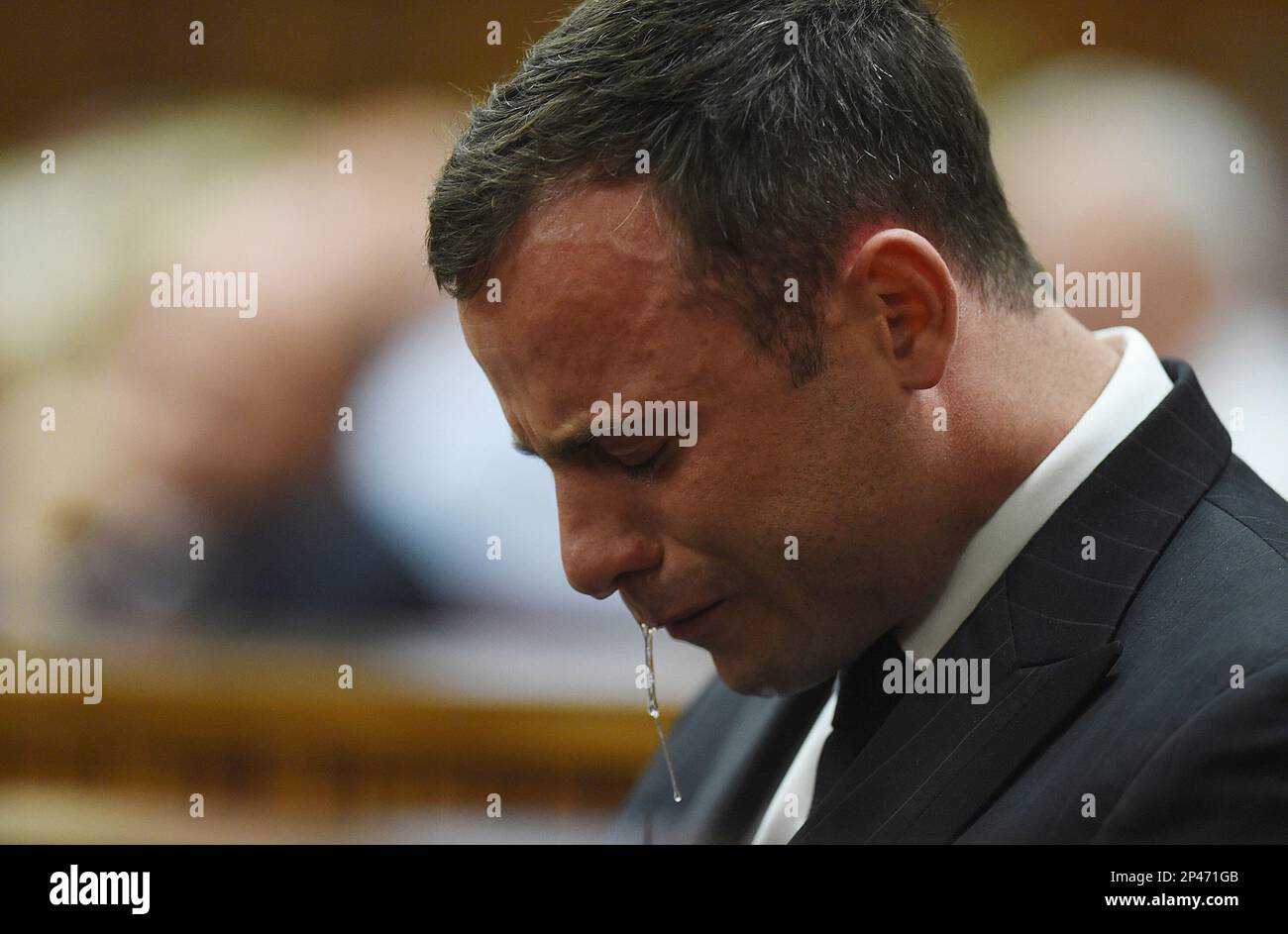 Oscar Pistorius cries in the dock in Pretoria, South Africa, Thursday ...