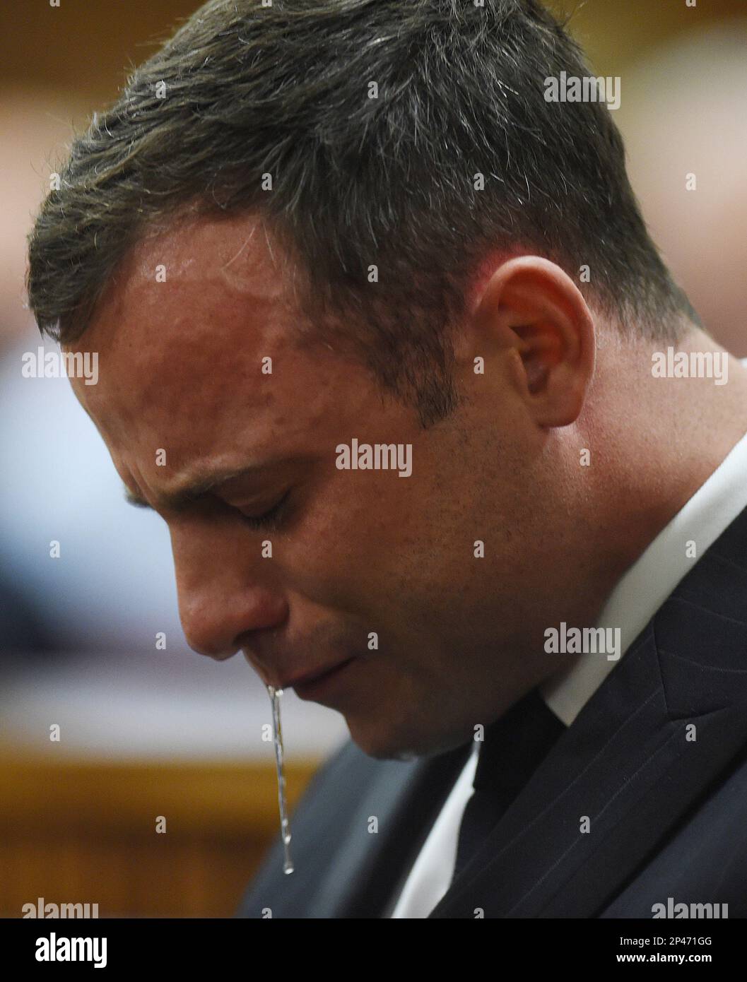 Oscar Pistorius cries in the dock in Pretoria, South Africa, Thursday ...
