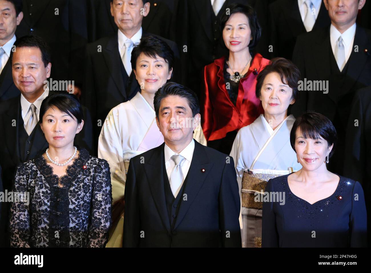 Japanese Prime Minister Shinzo Abe (front, C), poses for an inaugural ...