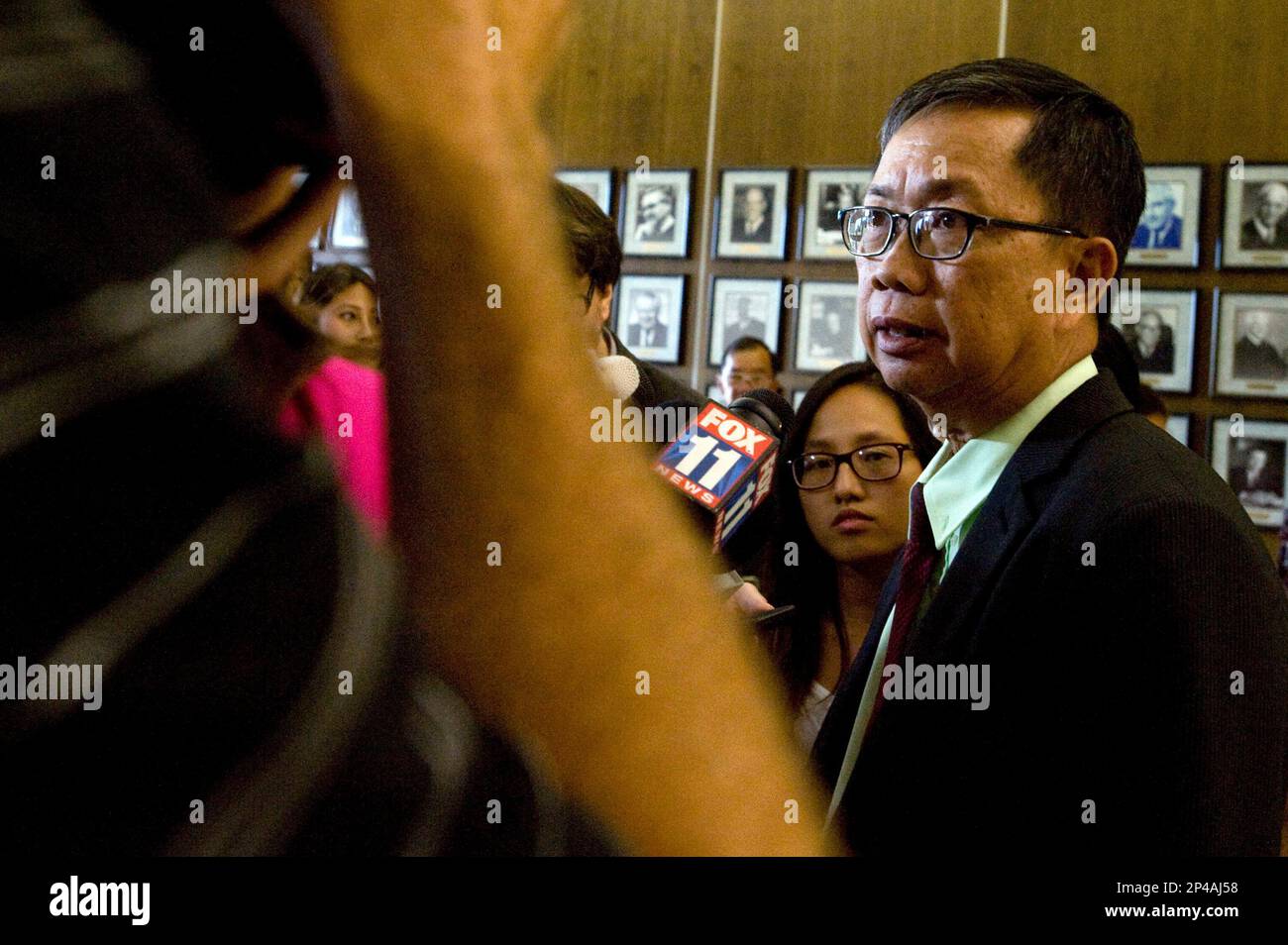 James Pham, father of Annie Kim Pham, speaks to the media after Candace Brito and Vanesa Zavala ...