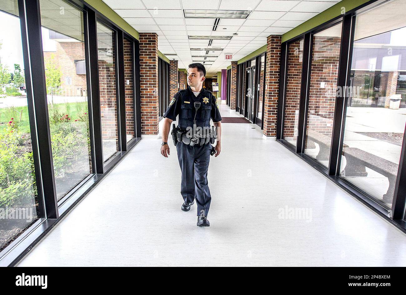 In this June 17, 2014 photo, McHenry County College police officer ...