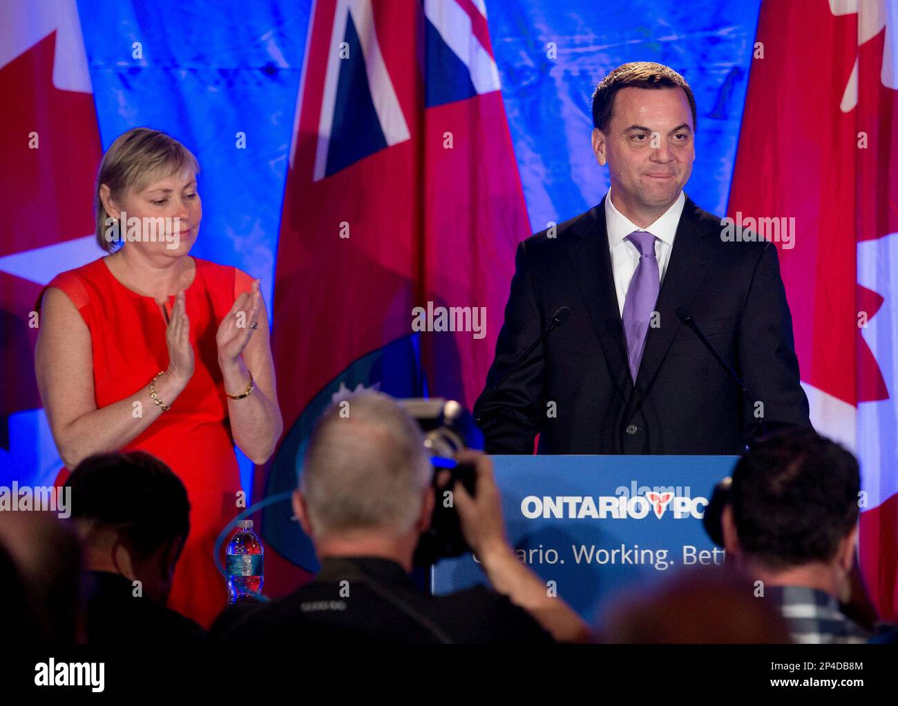 Ontario Progressive Conservative leader Tim Hudak, right, announces ...