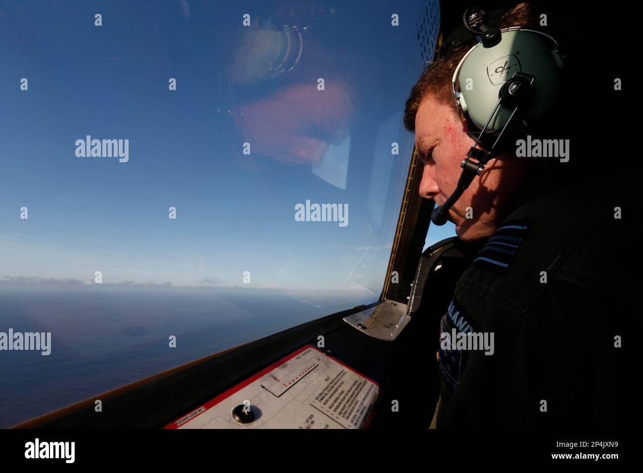 Royal New Zealand Air Force P-3K2 Orion co-pilot Brett McKenzie looks ...