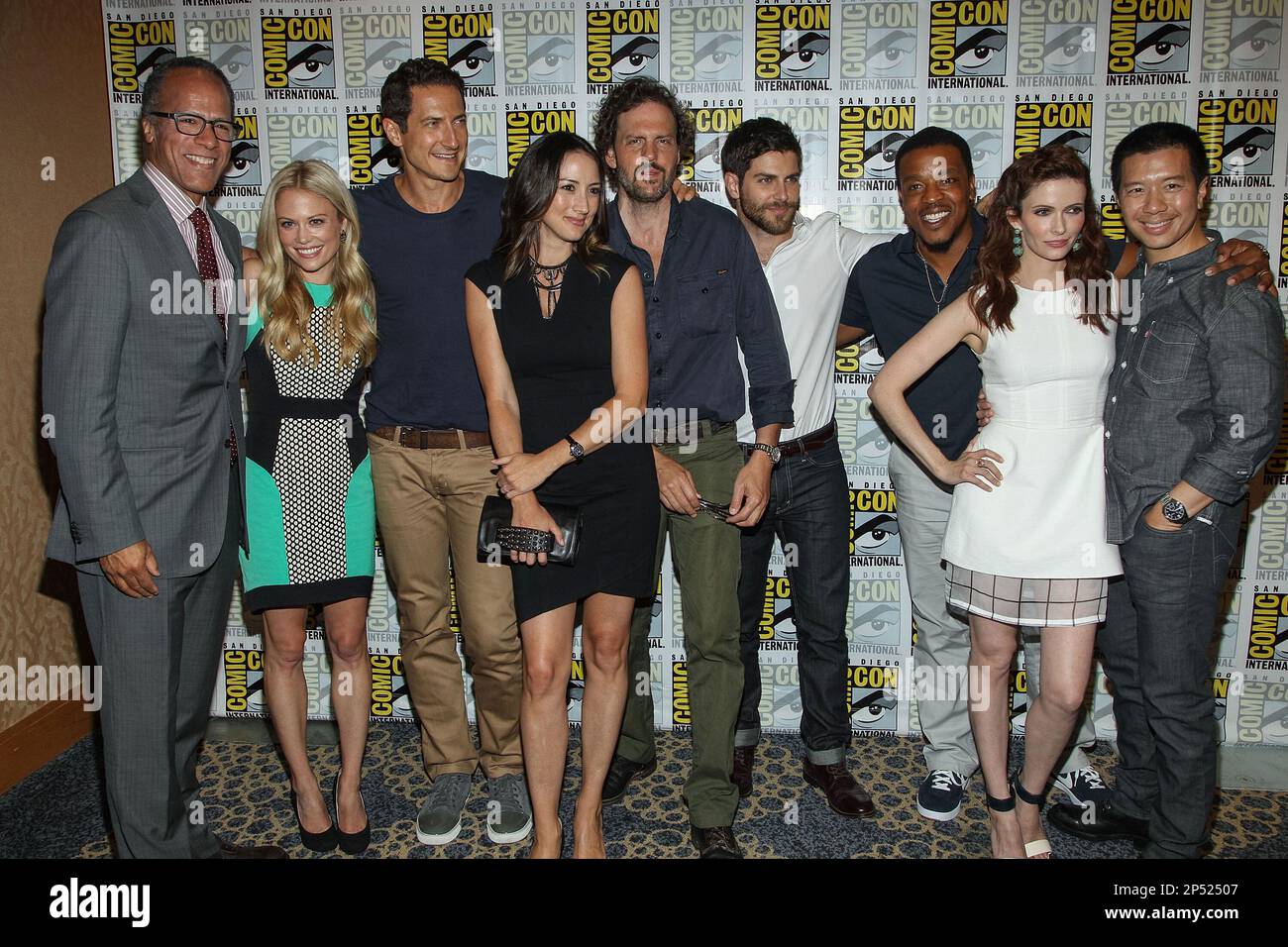 (L-R) NBC newscaster Lester Holt with actors Claire Coffee, Sasha Roiz ...