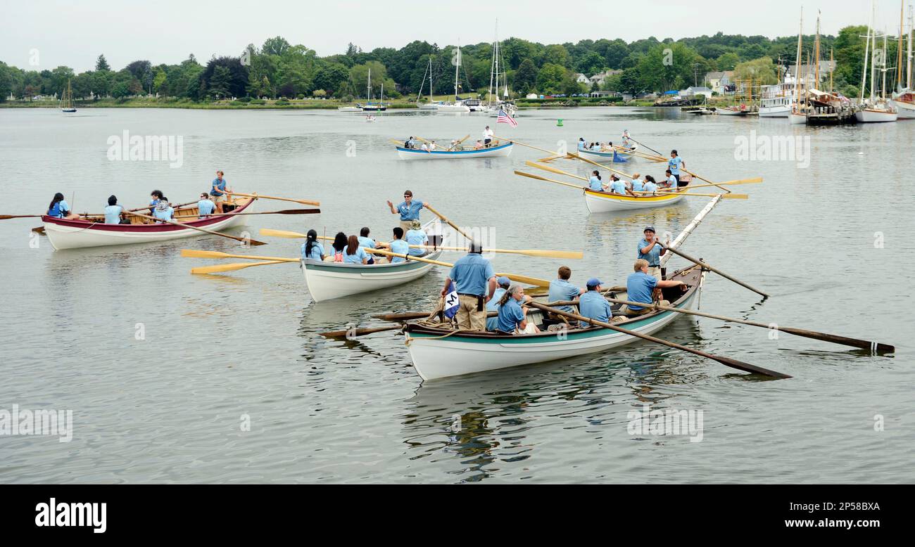Six of seven whaleboats gather in the Mystic River for a whaleboat ...