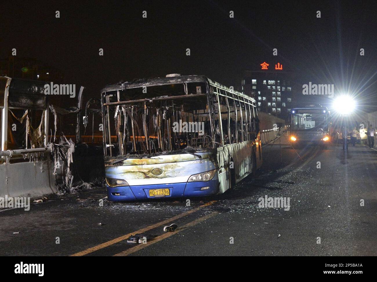 A view of the remains of a BRT (bus rapid transit) bus that burst into ...