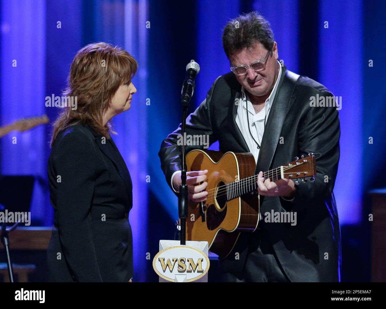 Vince Gill Cries As He Performs With Patty Loveless During The Funeral