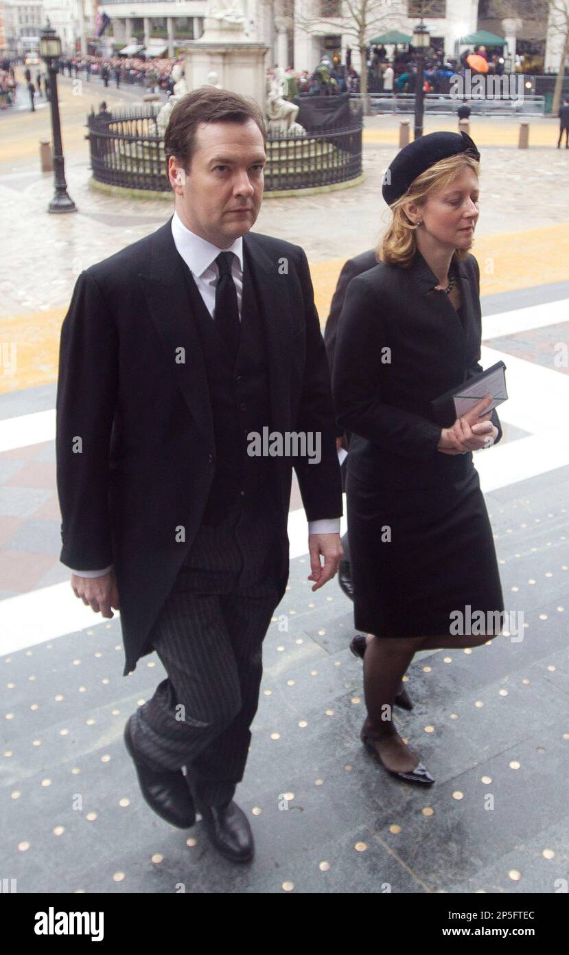 Britain's Chancellor George Osborne, left, and his wife Frances Osborne ...