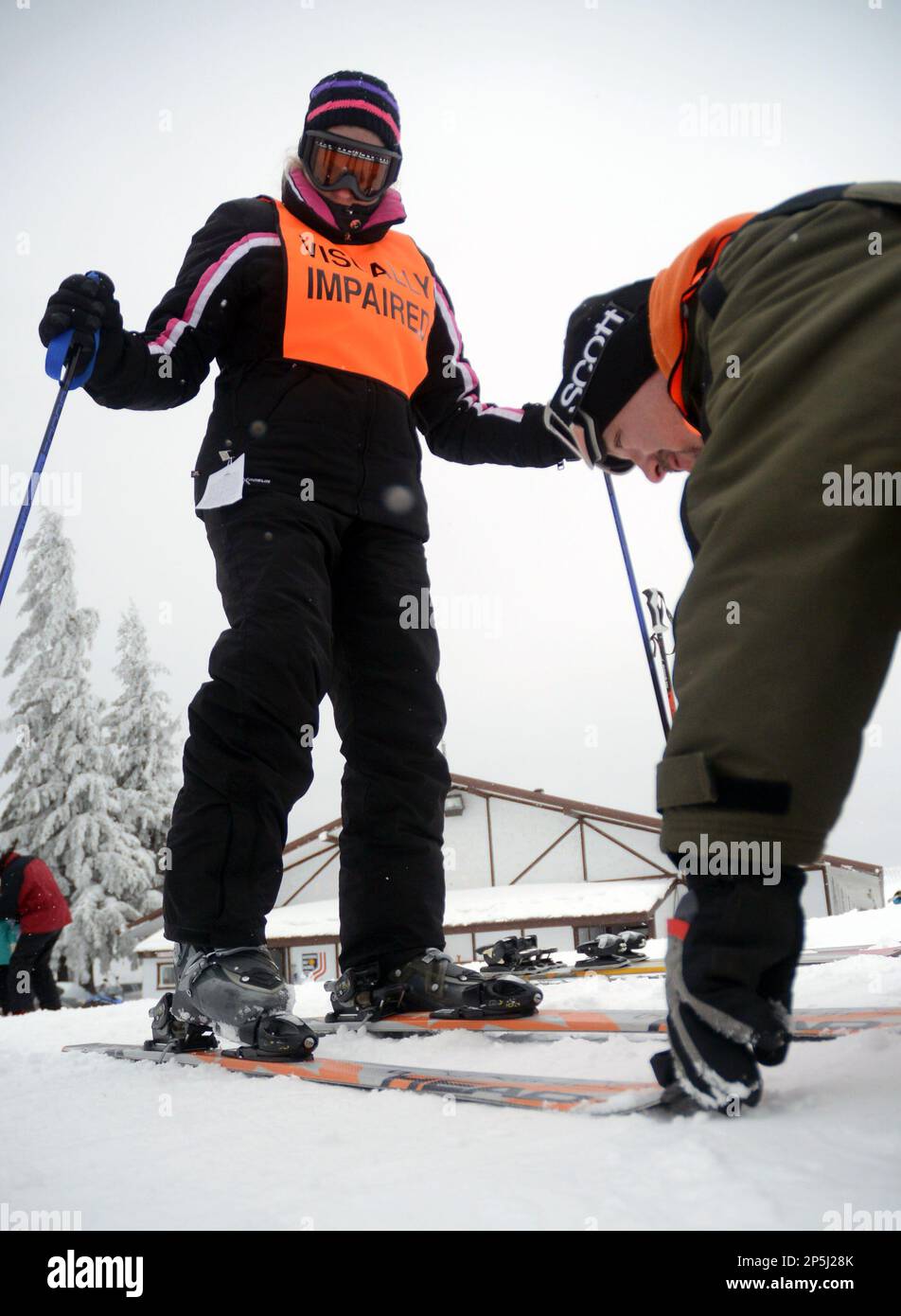 ADVANCED FOR RELEASE SATURDAY, MARCH 16, 2013 Lisa Hagerich gets help ...