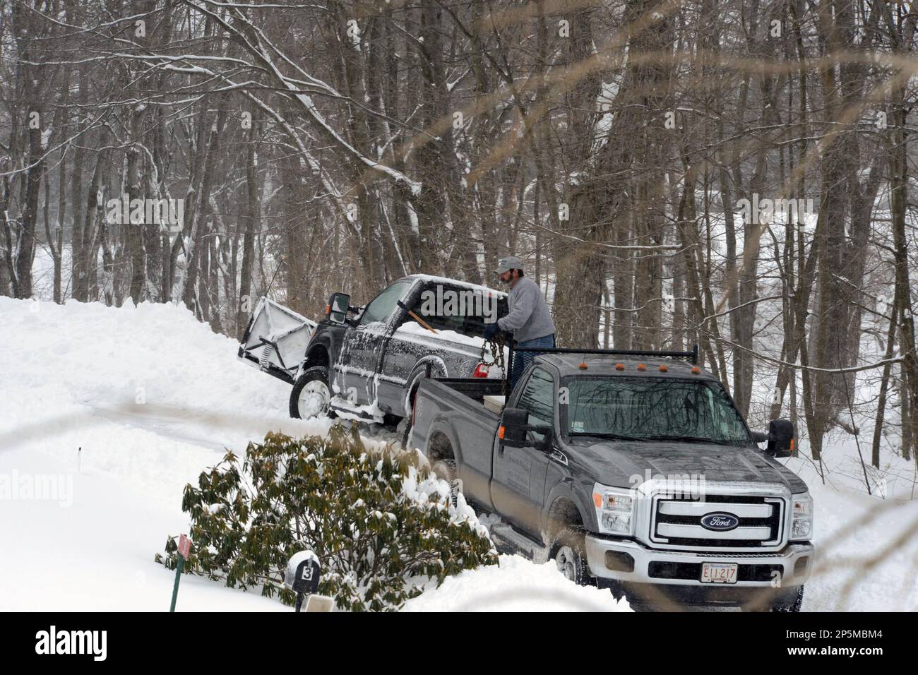 A private plow contractor gets stuck while plowing on. Chestnut Hill Rd ...