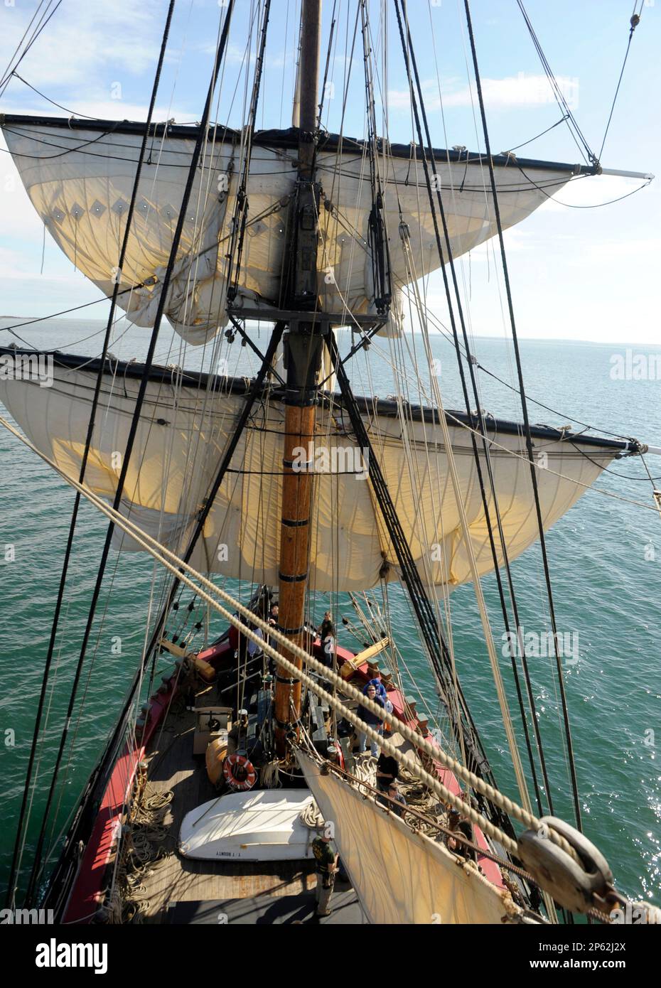 The view forward from the main mast as crew from the U.S. Navy Virginia ...