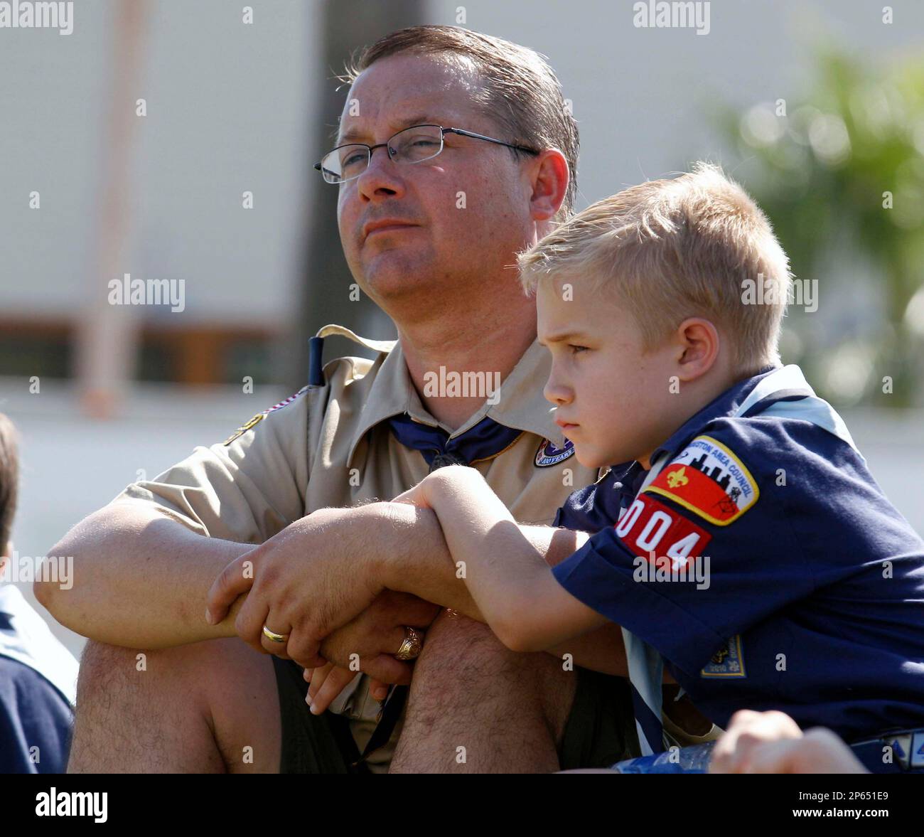 Eight-year-old Jonathan Foltyn of Cub Scout Pack 1004 and his father ...