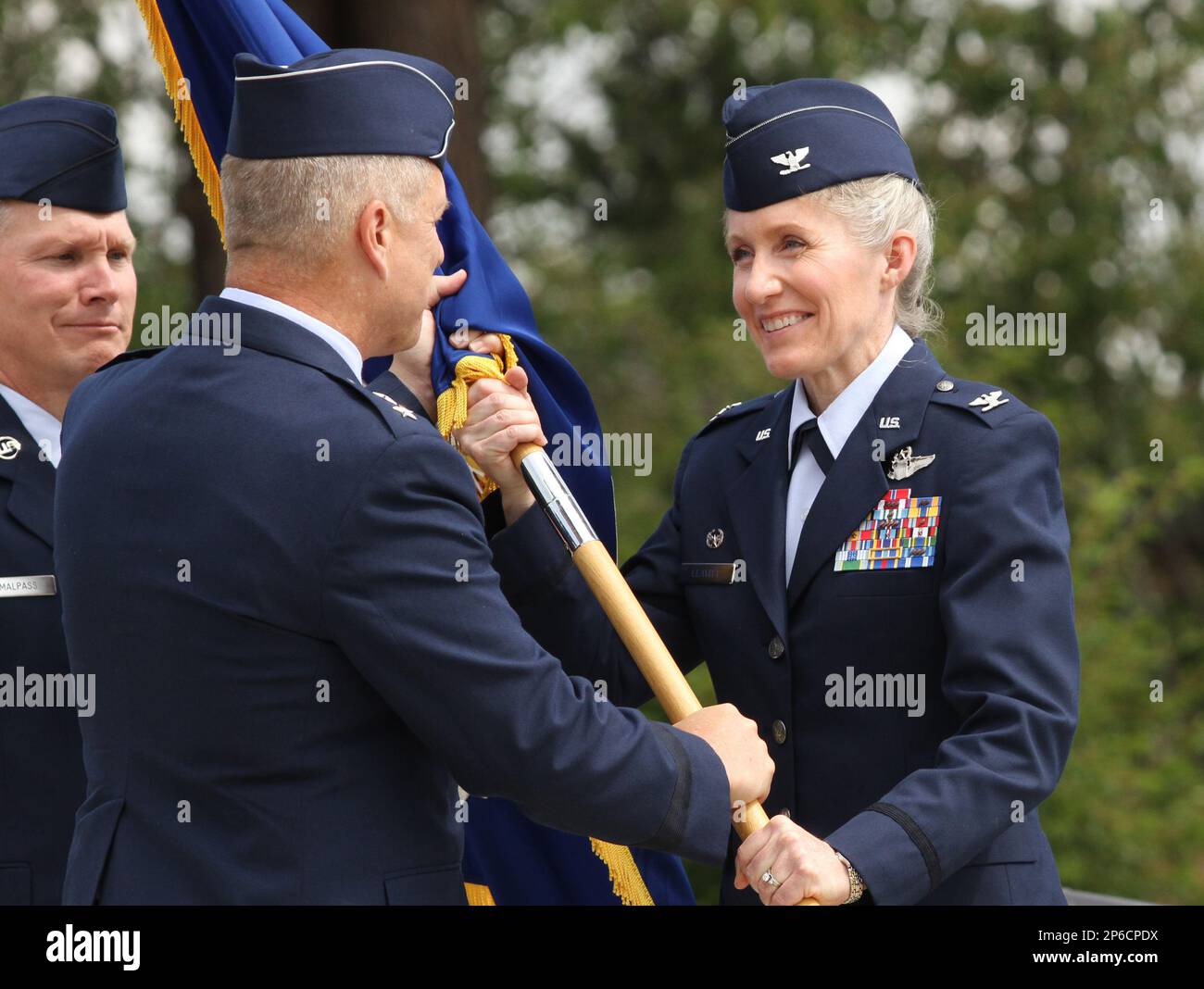 Air Force Col. Jeannie Leavitt, right, receives the Guidon from 9th Air ...