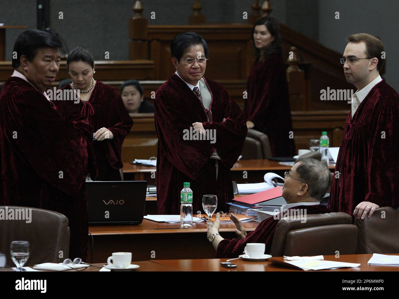 Philippine Senator Judges, left to right, Franklin Drilon, Loren ...