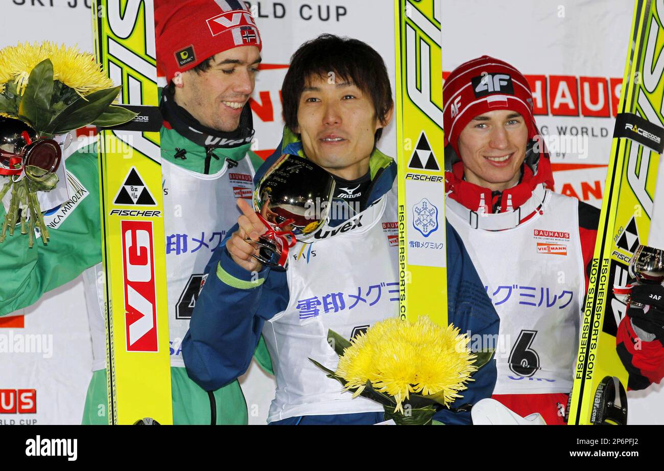The winner Daiki Ito of Japan, center, is flanked by second-placed Anders Bardal of Norway, left ...