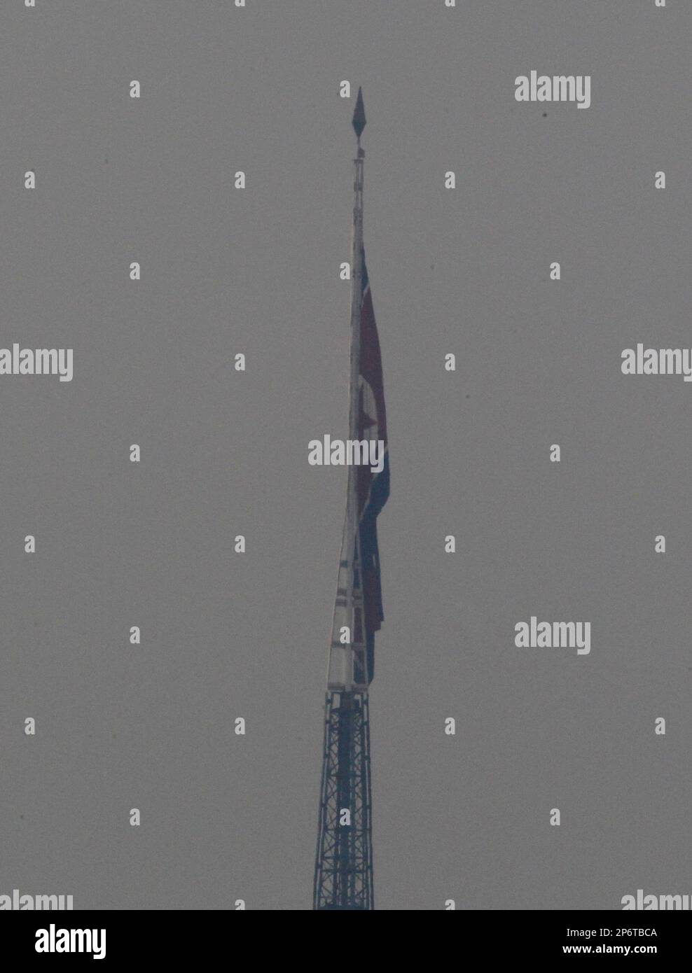 A huge North Korean flag hangs at half-mast at North Korea's propaganda ...