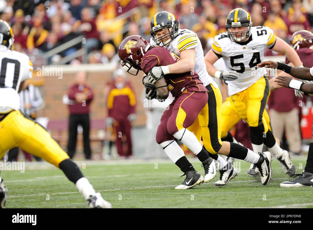 2011 OCT 29: Minnesota RB Duane Bennett (22) is tackled by Iowa's Tyler ...