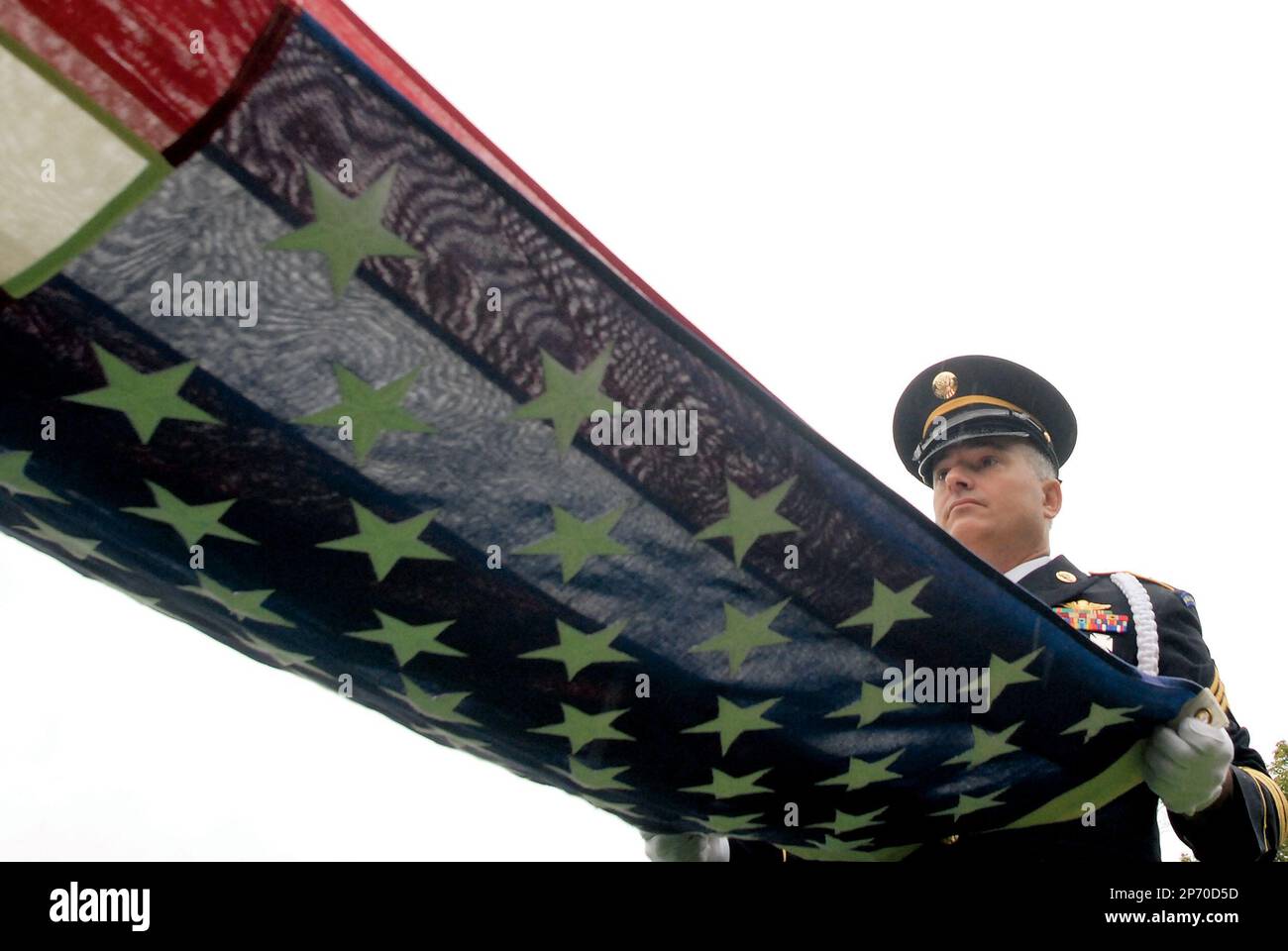 Sgt. Dan Reese, right, and Spc. Lucas Kirkland rehearse folding and ...