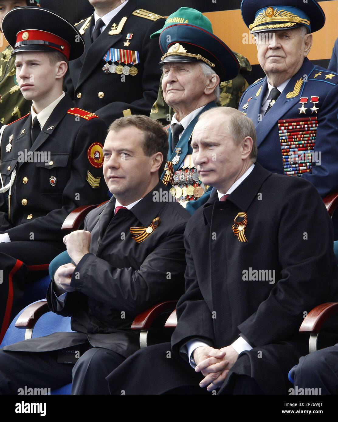 Russian President Dmitry Medvedev, foreground left and Prime Minister ...