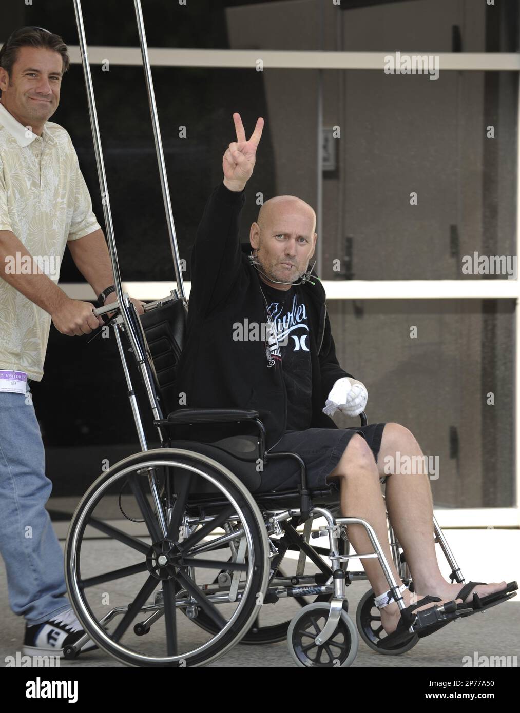 Steve Wills, an LAPD SWAT Officer, pushes his friend Officer Steve ...