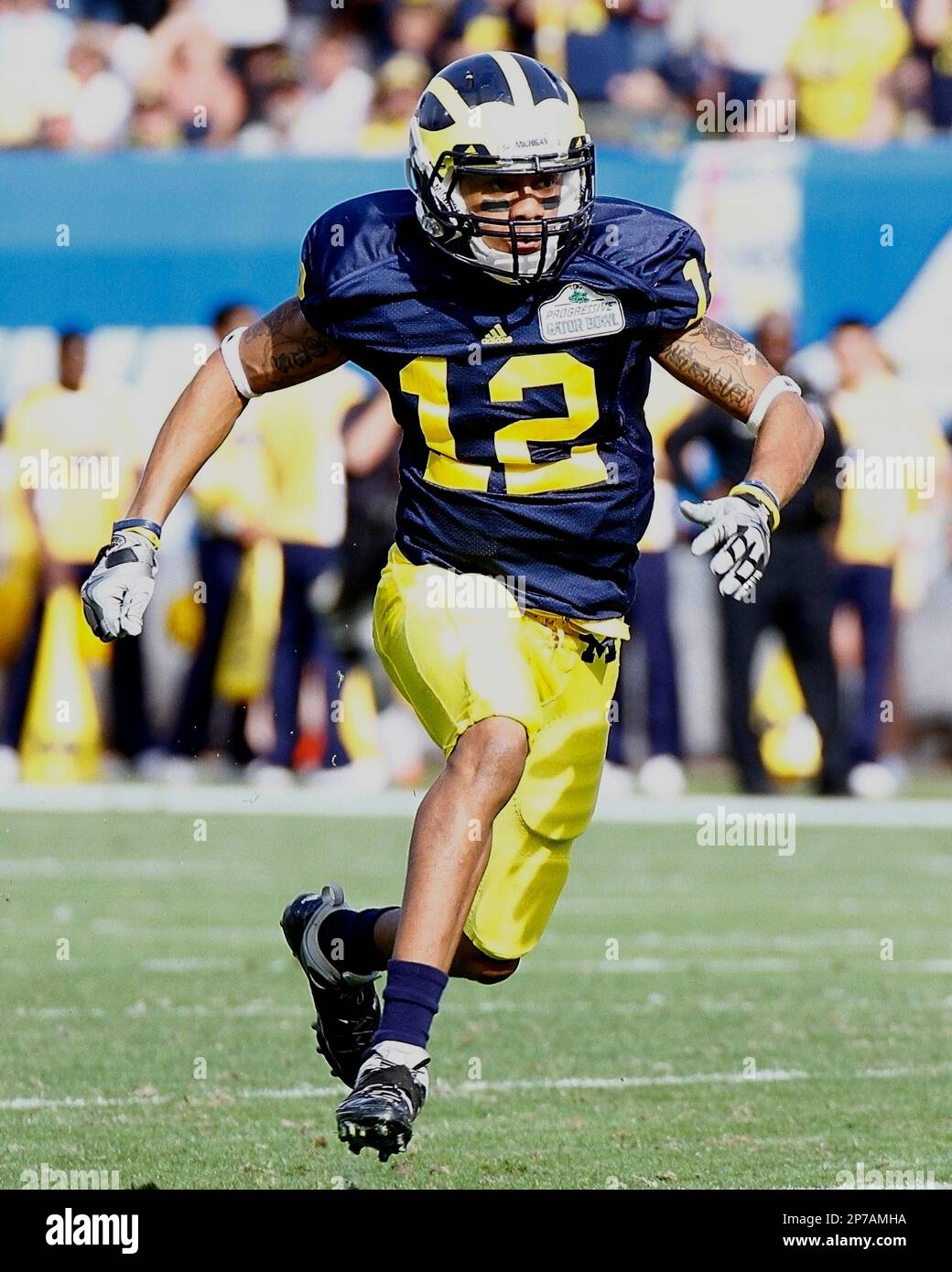 Michigan Wide Reciever (12) Roy Roundtree on a passing route in the ...