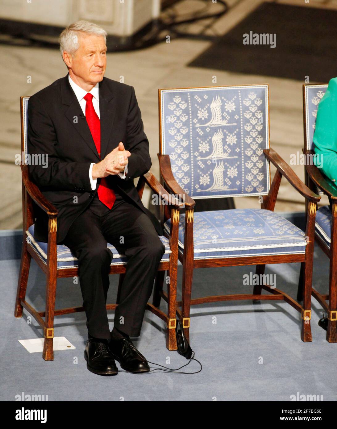 Nobel Peace Prize committee chairman Thorbjorn Jagland applauds next to ...