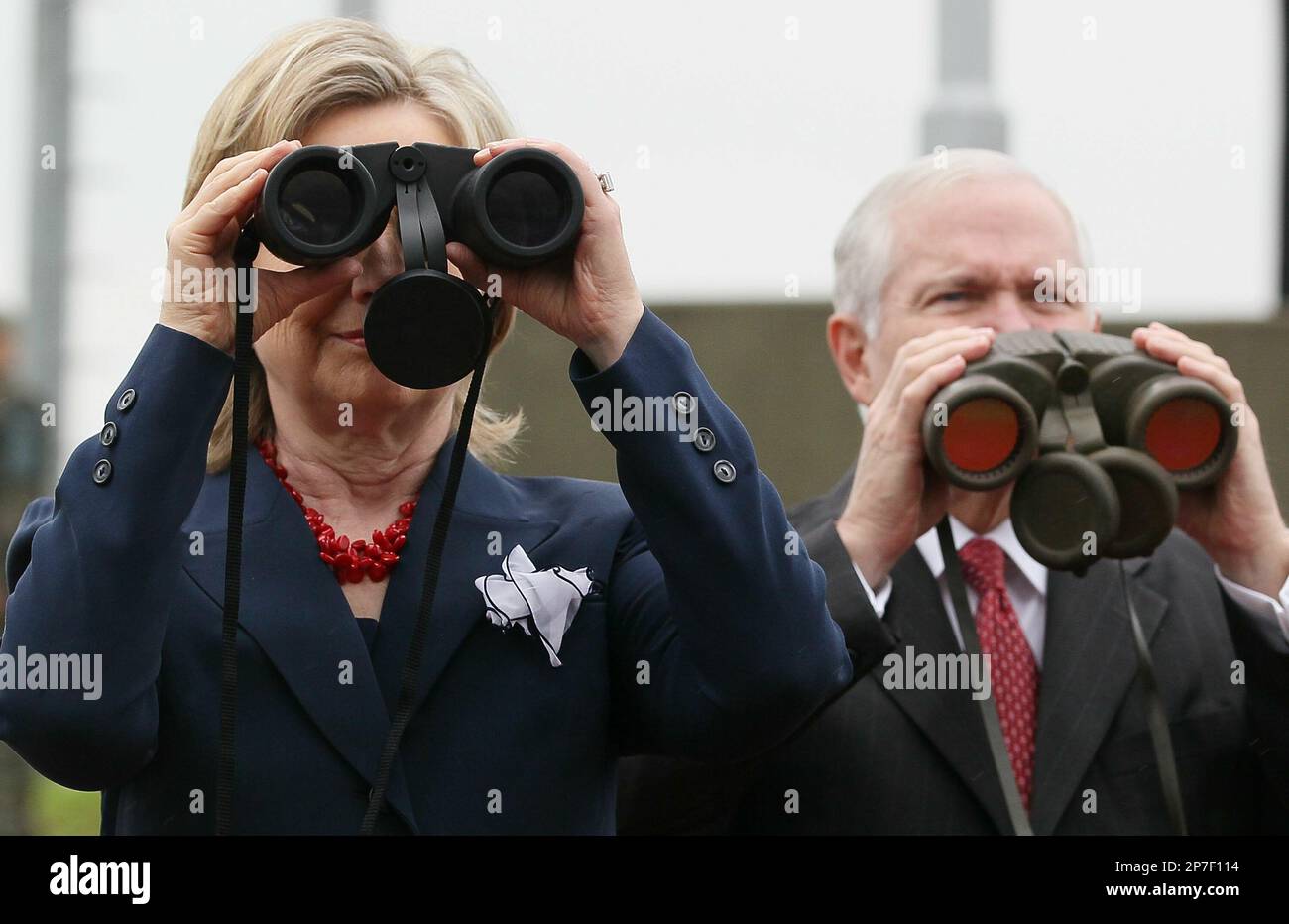 U.S. Secretary of Defense Robert Gates, right, and Secretary of State ...