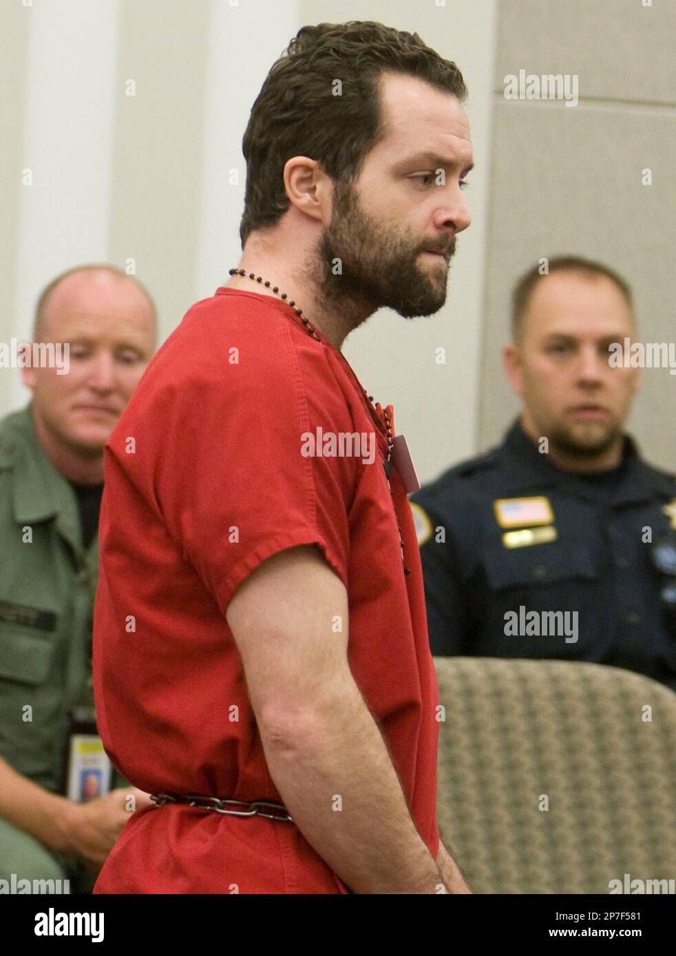 Nathan Sloop enters the courtroom to appear before Judge Michael ...