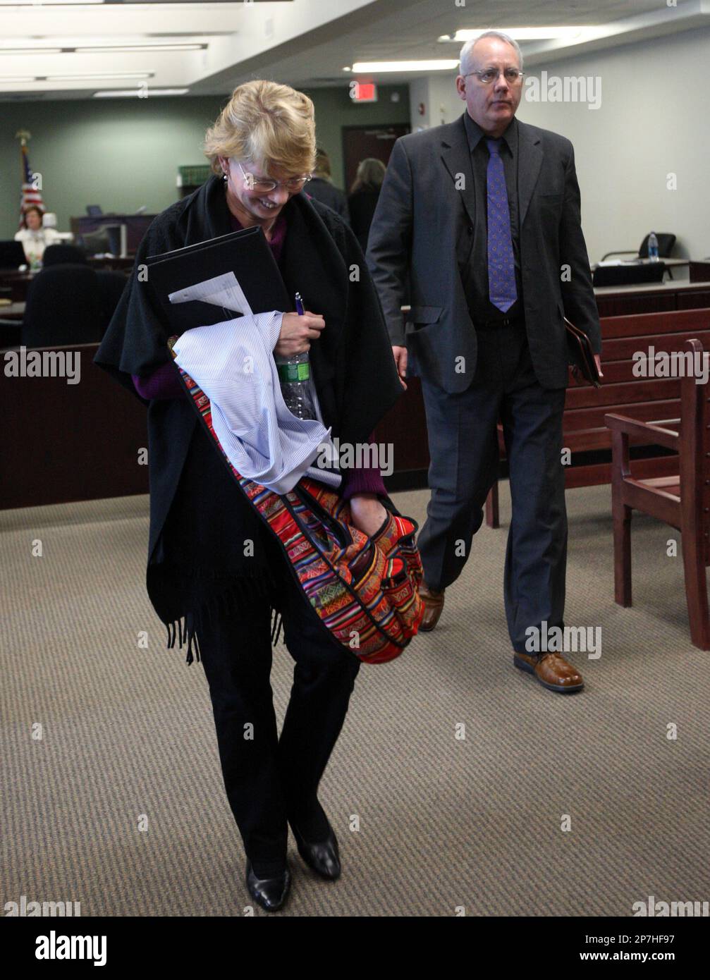 Dorothy Odgren, left, and her husband, Paul, leave the courtroom during ...