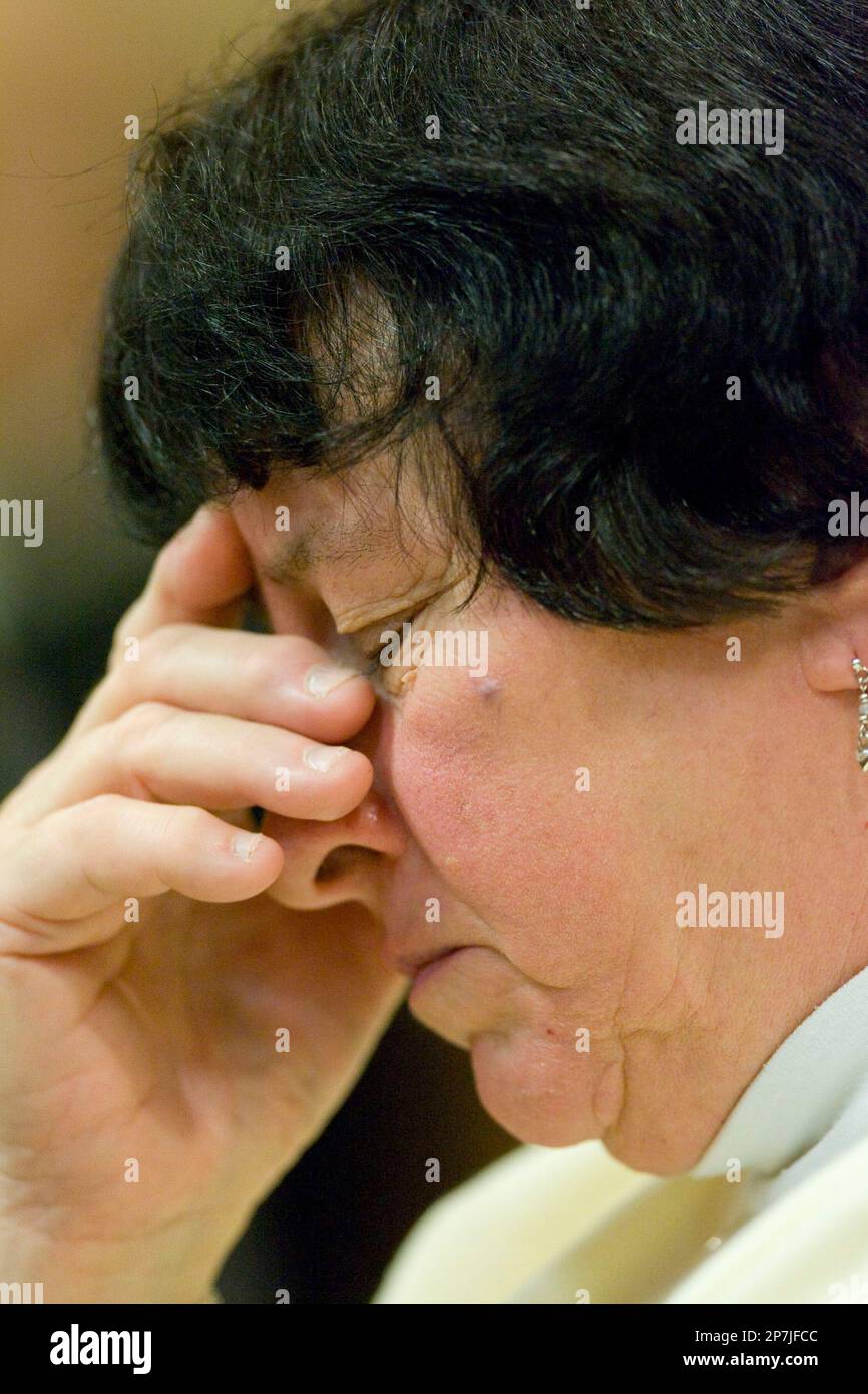 Barbara Wing, mother of Kelly Wing Schmidt, listens to Scott E. Schmidt ...