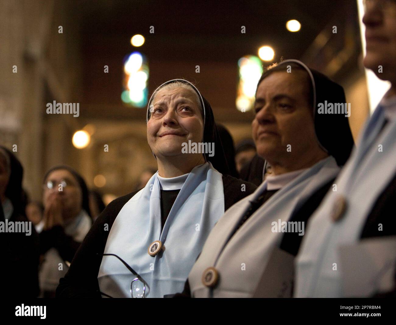 Catholic nuns look up at a poster of Maria Alfonsina Danil Ghattas, not ...