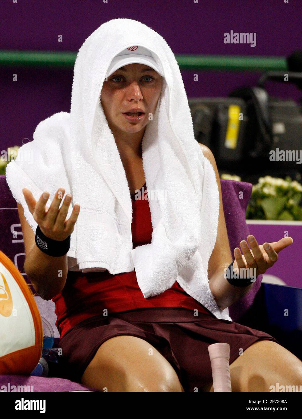 Vera Zvonareva of Russia reacts during her singles match to Caroline ...