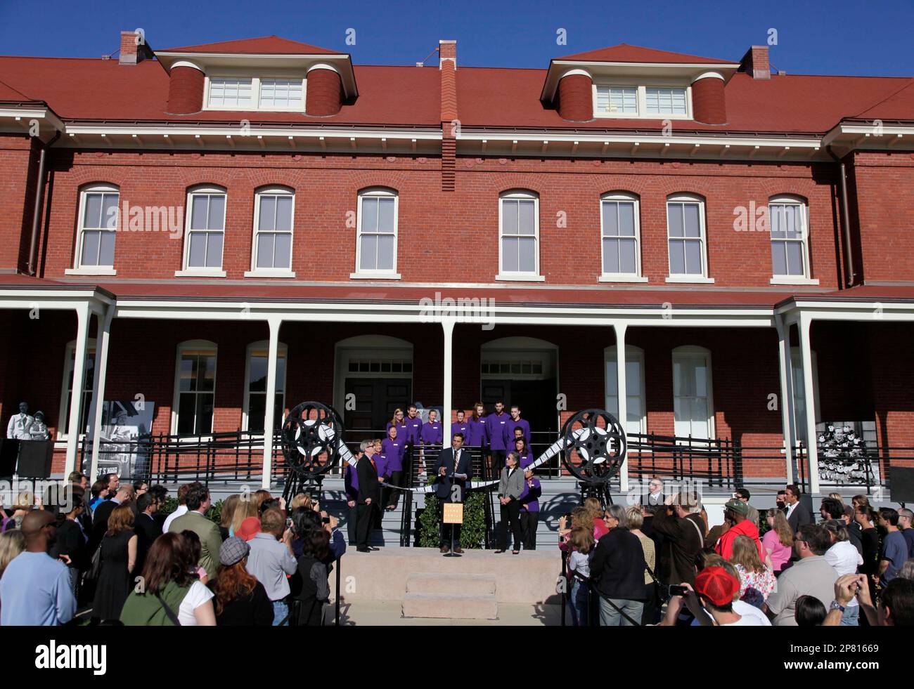 Walter E.D. Miller, center, Walt Disney's grandson and president of the ...