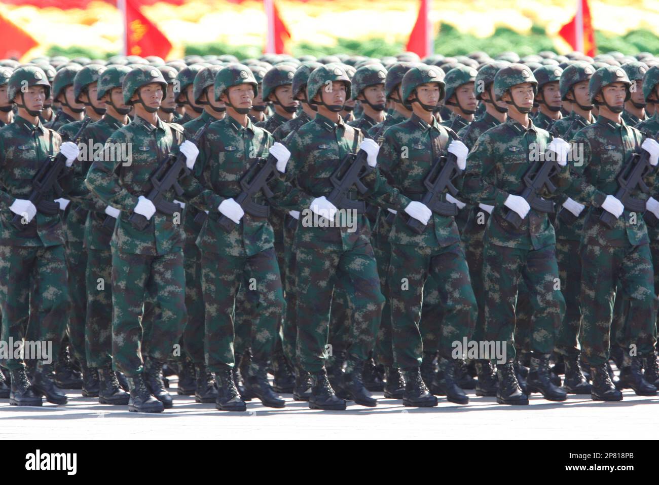Chinese People's Liberation Army (PLA) soldiers march past Tiananmen ...