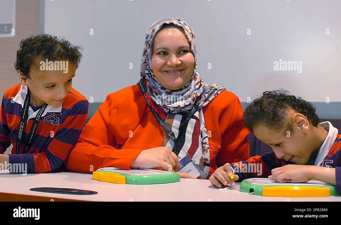 Formerly conjoined twins Mohamed, left, and Ahmed Ibrahim playy with ...