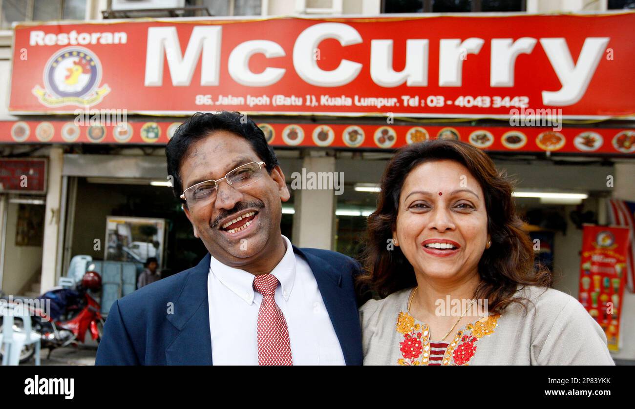 McCurry restaurant owner A.M.S.P. Suppiah and his wife Kanageswary pose ...
