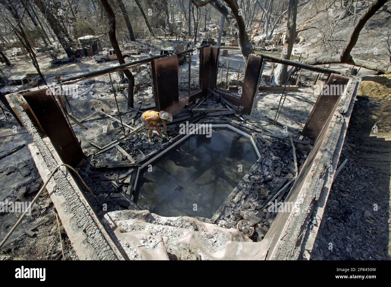 Avianna Veneto, an employee of Lew Johnson, not shown, surveys the hot ...