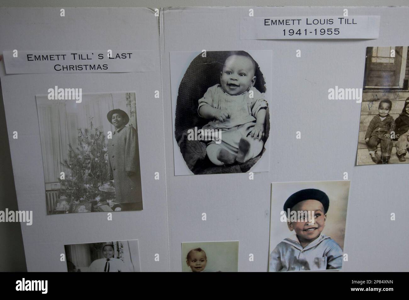 Photos of Emmett Till are displayed during an event at Roberts Temple ...