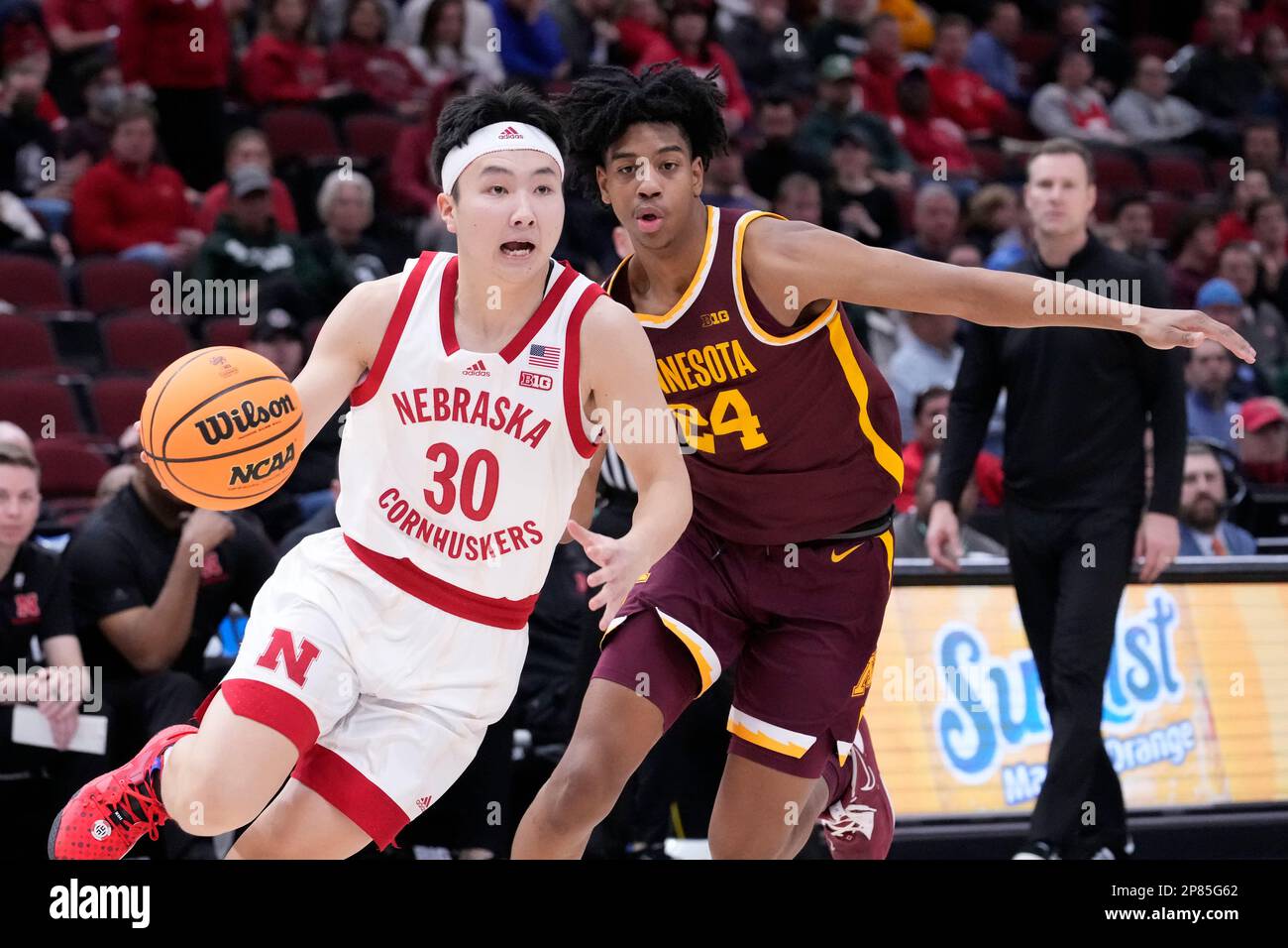 Nebraska's Keisei Tominaga drives to the basket past Minnesota 's Jaden ...
