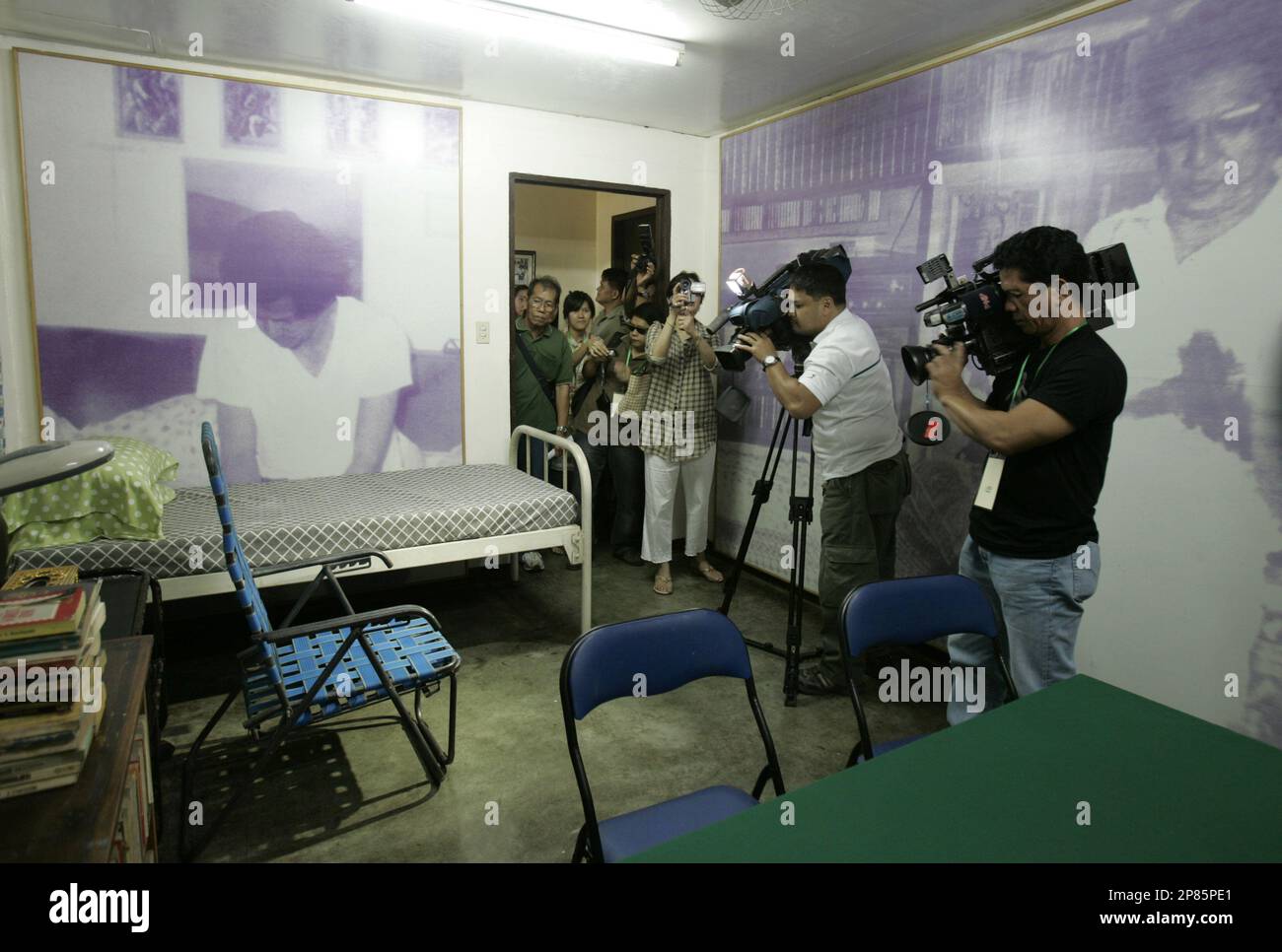 Filipino media take footage of the former prison cell of late senator ...