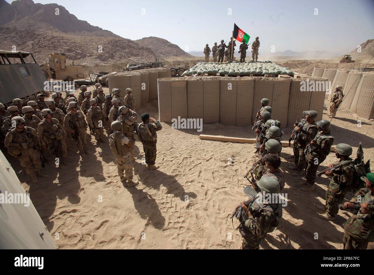 Afghan National Army soldiers, right, and United States Marines from ...