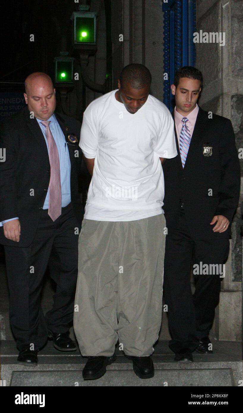 Hasib Cutts, 30, center, is escorted out of the 19th Precinct in New ...