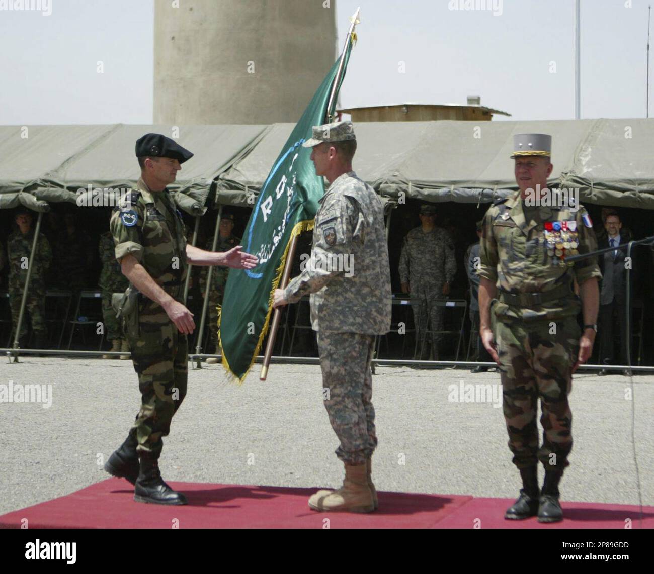 U.S. Gen. Stanley McChrystal, center, commander of the NATO-led ...
