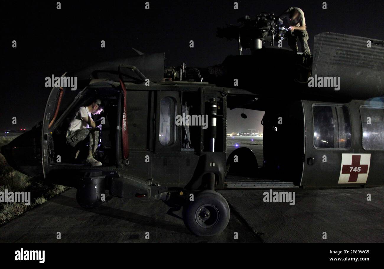 A maintenance crew with the 3rd Batallion of the 82nd Combat Aviation ...