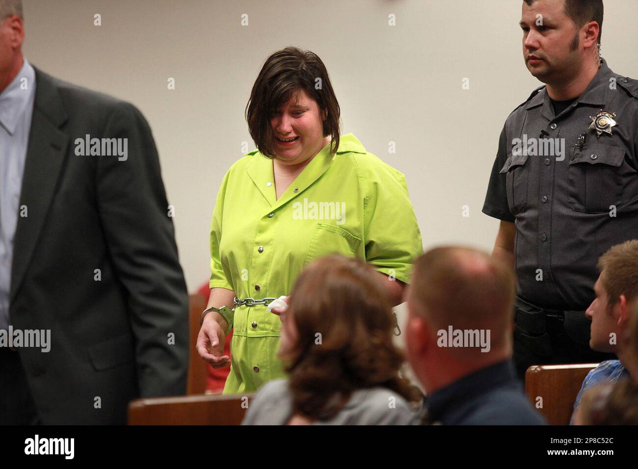 Korena Roberts enters the Washington County courtroom in Hillsboro, Ore ...